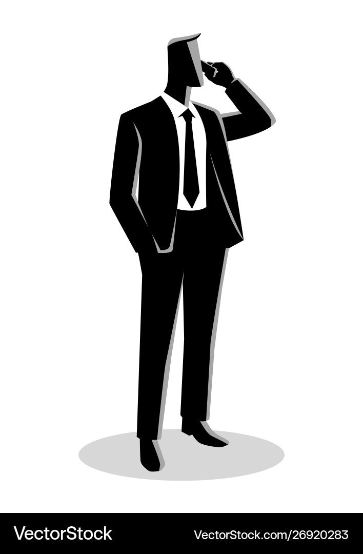 Businessman in formal suit standing while on phone