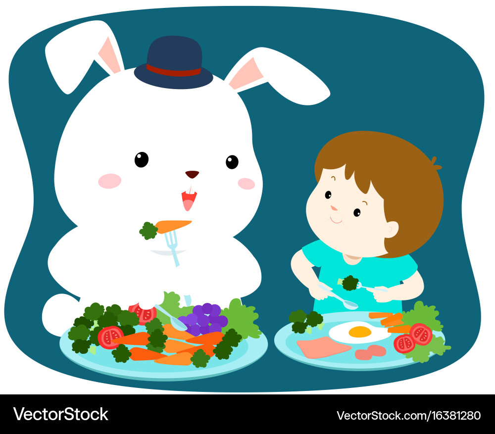 Little cute boy eating vegetable with white rabbit