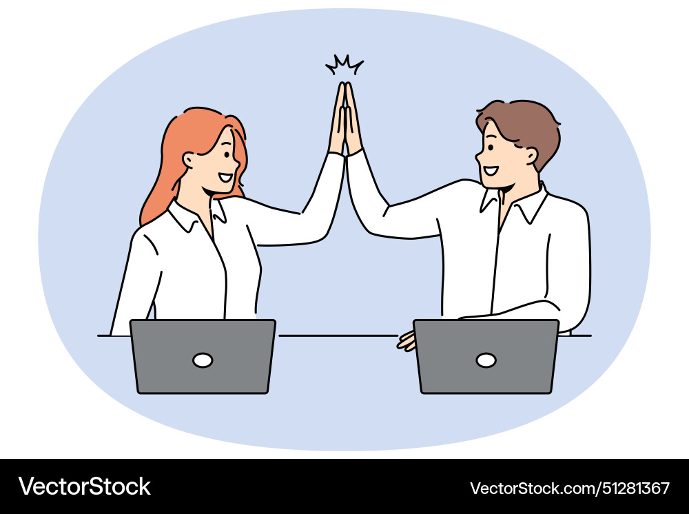 Smiling colleagues give high five working together