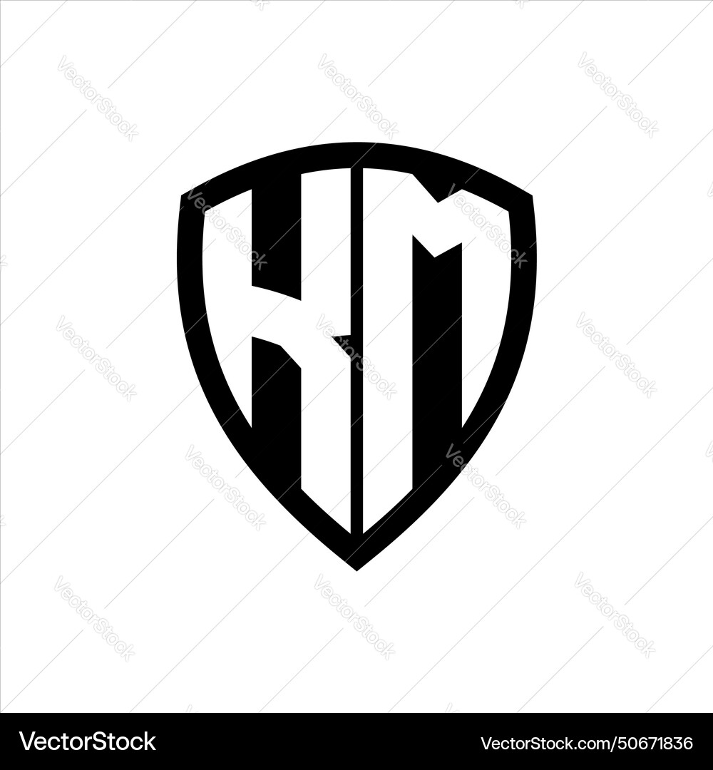 Km monogram logo with bold letters shield shape Vector Image