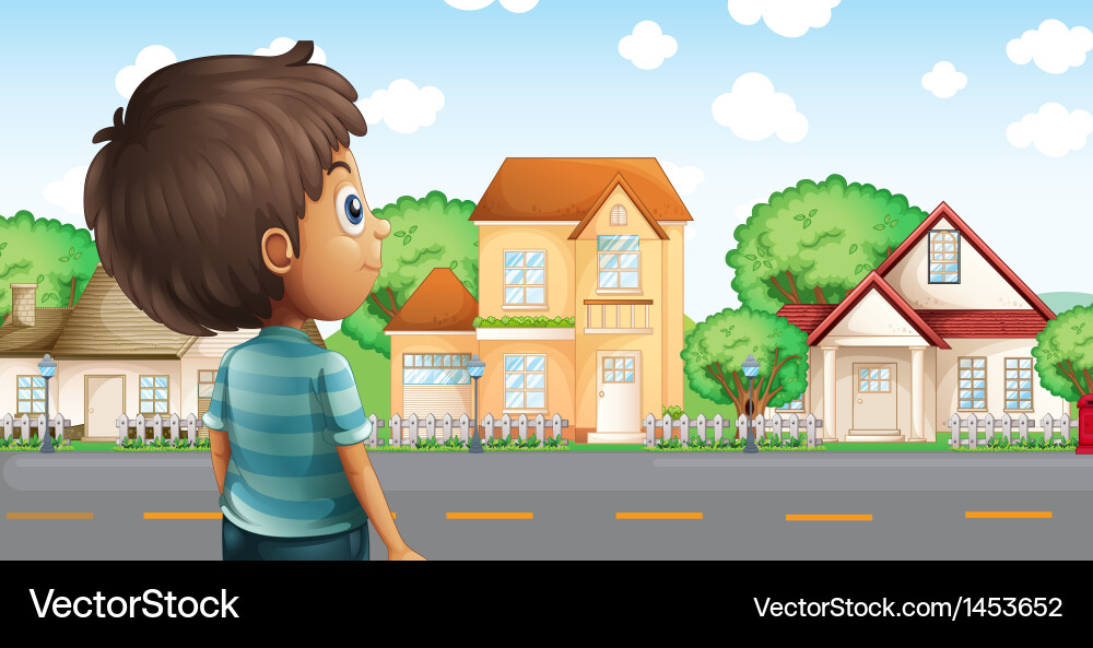 A young boy standing across the village Royalty Free Vector