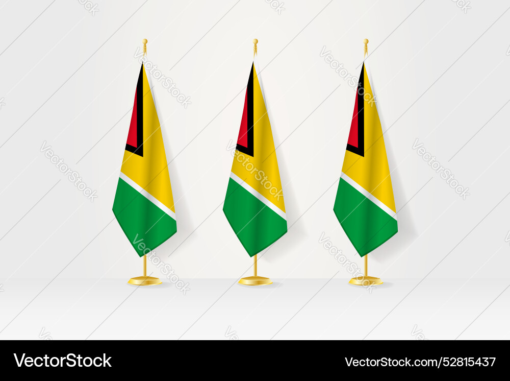 Three guyana flags in a row on golden stand Vector Image