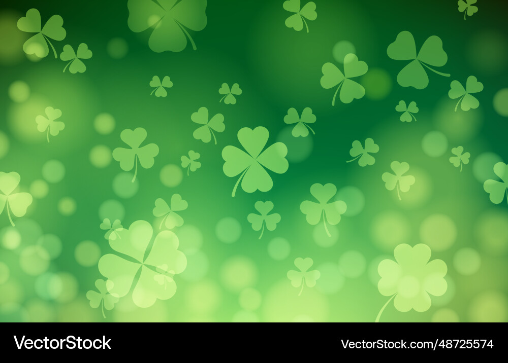 Bokeh background with falling clover leaves Vector Image