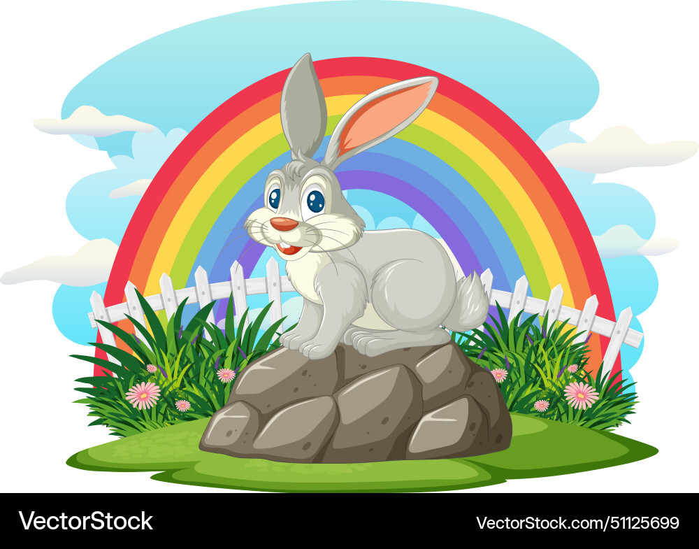 Cartoon rabbit on rocks under a colorful rainbow Vector Image