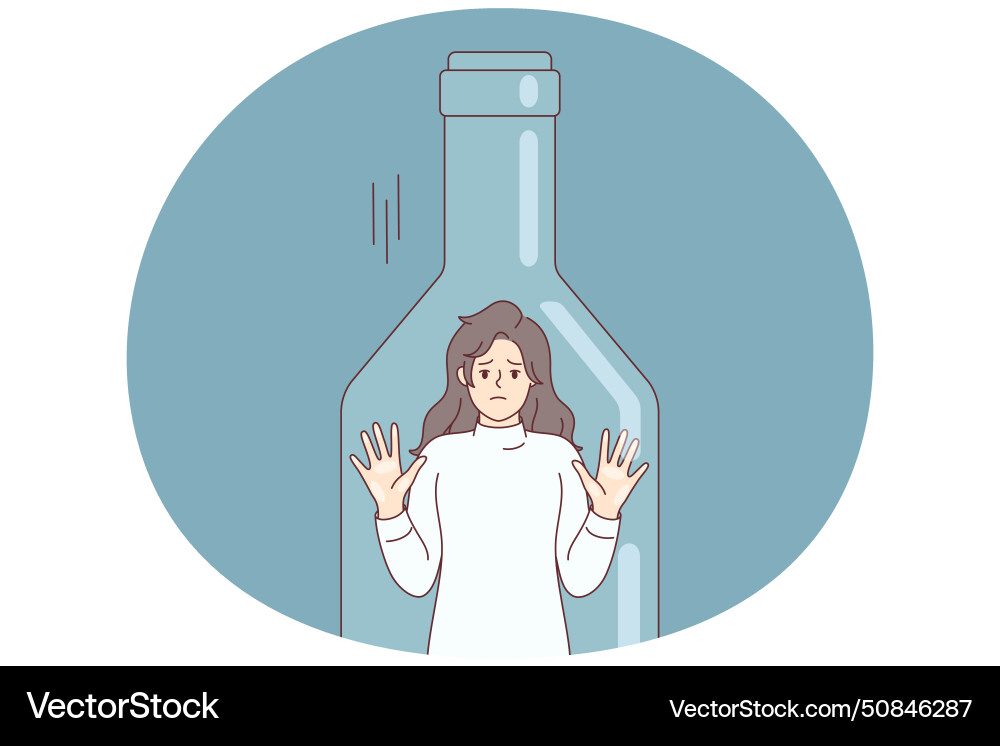 Depressed woman standing inside transparent bottle