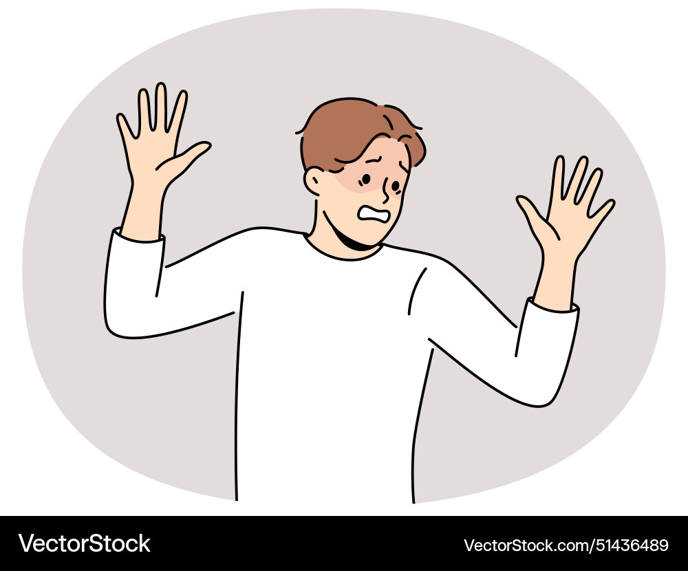 Frightened man raises hands in surrender Vector Image