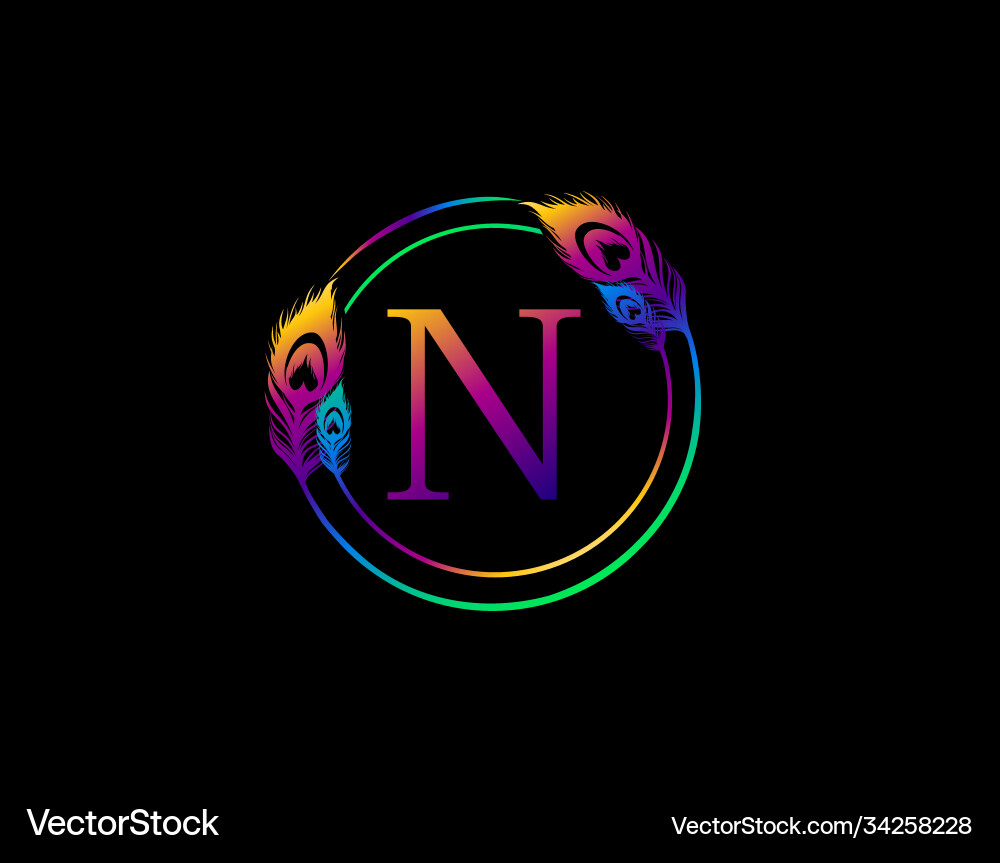 N letter decorated with exotic peacock feather Vector Image