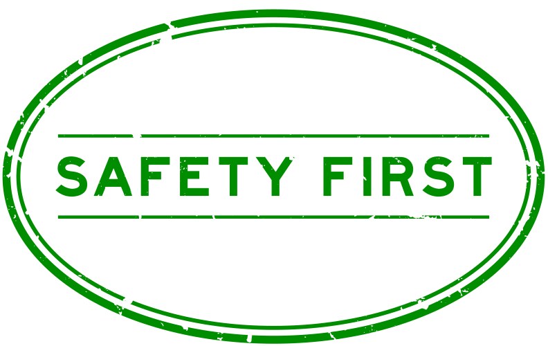 Grunge green safety first word rubber seal stamp Vector Image