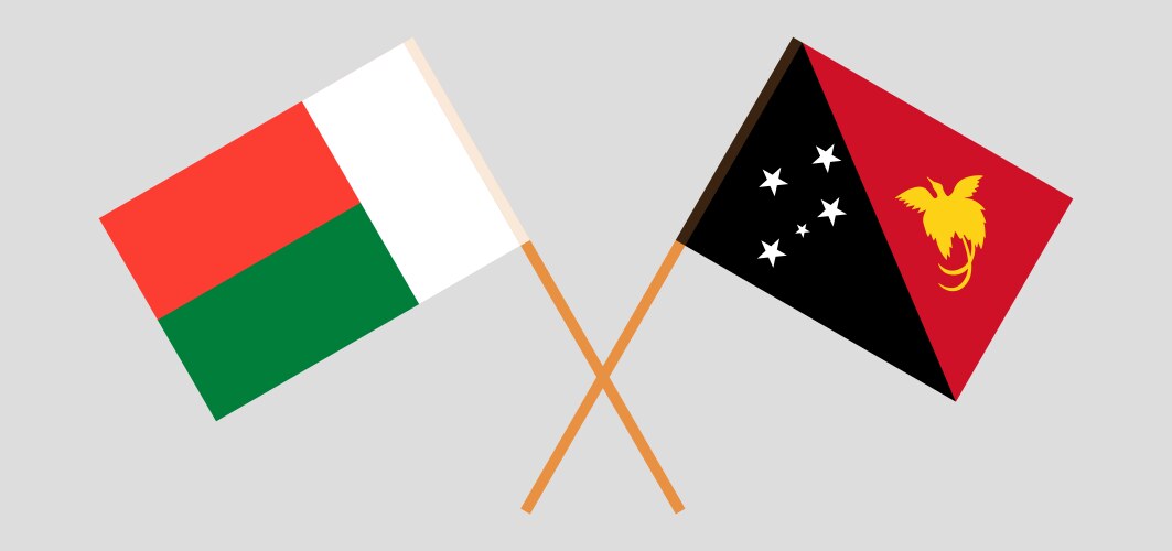 Crossed flags of the comoros and papua new guinea Vector Image