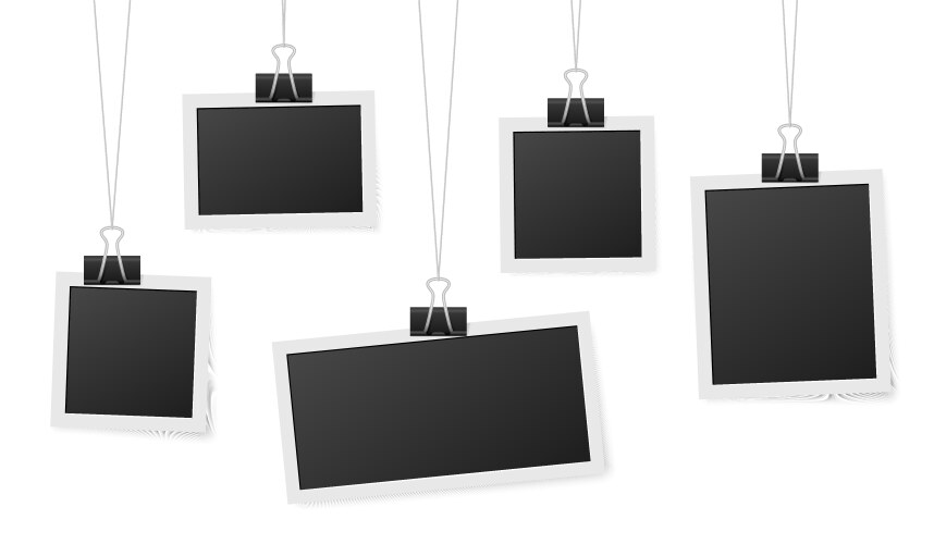 Retro photo frames hanging on rope isolated Vector Image