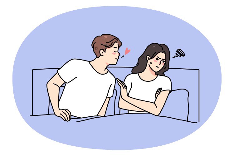 Angry young couple lying apart in the bed using Vector Image