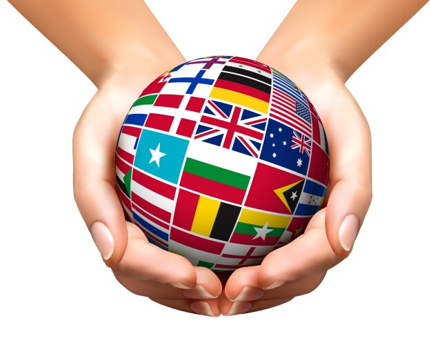 Flags of the world on a globe held in hand Vector Image