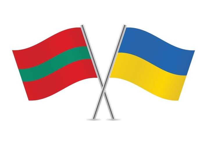 Partner handshake with flags of ukraine and united