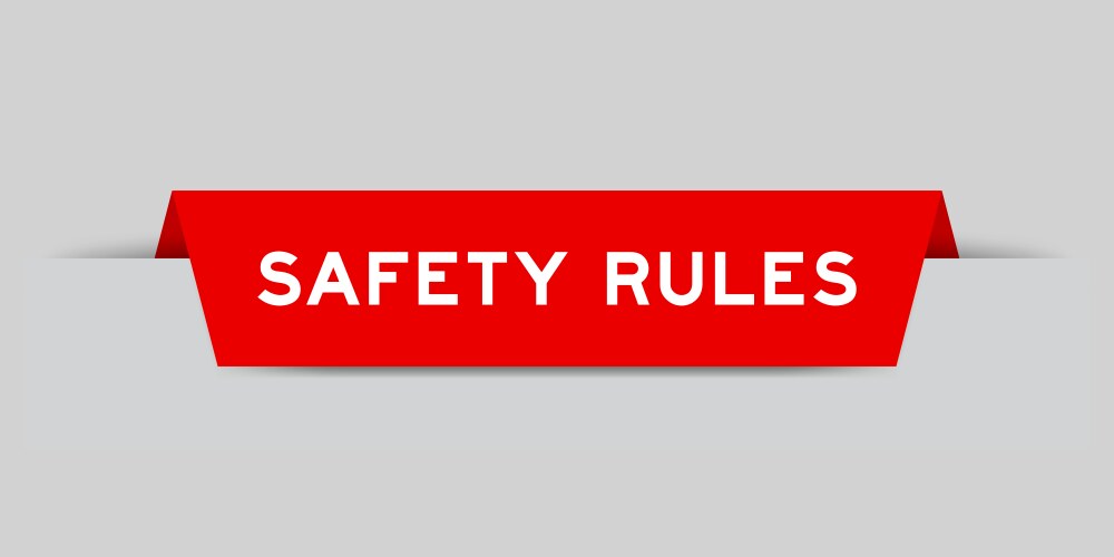 Red color of corner label banner with word safety Vector Image