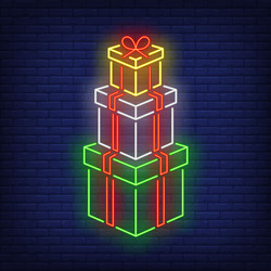 Gift box neon sign Royalty Free Vector Image - VectorStock