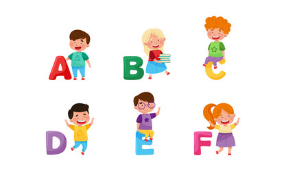 Cheerful kids standing with big alphabet letters Vector Image