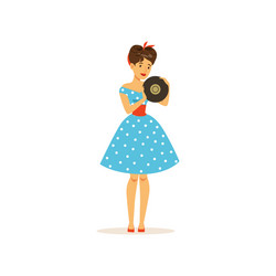 Beautiful young woman in a blue polka dot dress Vector Image
