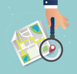 Hand holding magnifying glass and pin location Vector Image