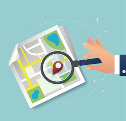 Hand holding magnifying glass and pin location Vector Image