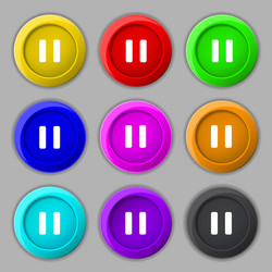 Pause icon sign symbol on nine round colourful Vector Image