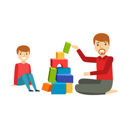 Cartoon boy playing with building blocks Vector Image