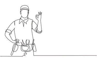 Single one line drawing of young handyman holding Vector Image
