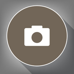 Digital camera sign white icon on brown Royalty Free Vector