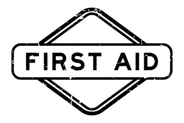 Grunge red first aid word round rubber seal stamp Vector Image