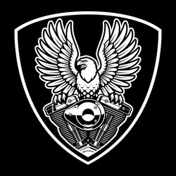 An eagle on a motorcycle engine badge Royalty Free Vector