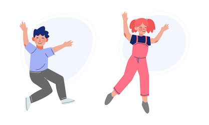 Smiling teen boy and girl jumping with joy raising