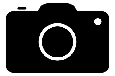 Photo camera camera symbol in black Royalty Free Vector