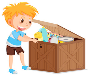 A boy putting his toy into the box Royalty Free Vector Image