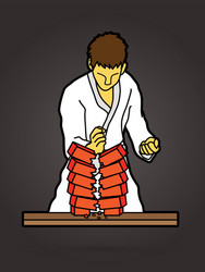 Karate man breaking bricks graphic Royalty Free Vector Image