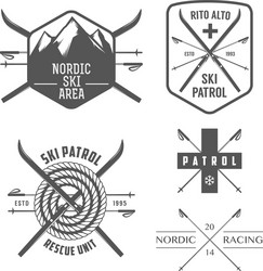 Set of vintage skiing labels and design elements Vector Image