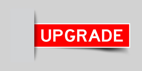 Red color peel sticker label with word upgrade Vector Image
