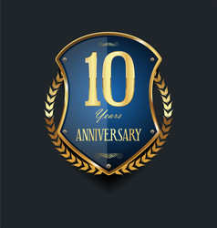 10 years anniversary golden shield Royalty Free Vector Image