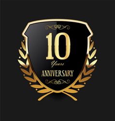 10 years anniversary golden shield Royalty Free Vector Image