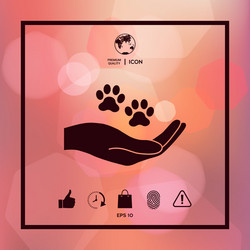 Hand holding paw symbol animal protection Vector Image