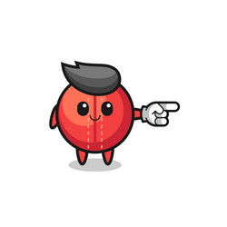 Spiky ball mascot with pointing right gesture Vector Image