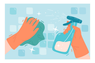 Hands in rubber gloves cleaning surface with spray