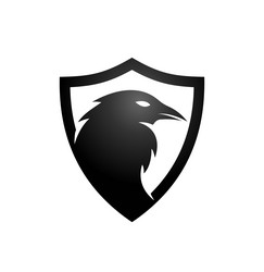 Raven in shield logo design Royalty Free Vector Image