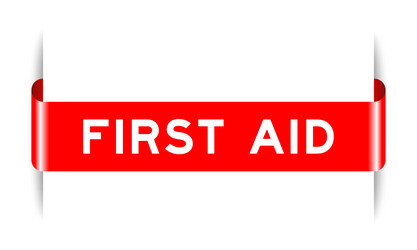 Red color speech banner with word first aid Vector Image