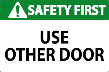 Safety first sign caution use other door Vector Image