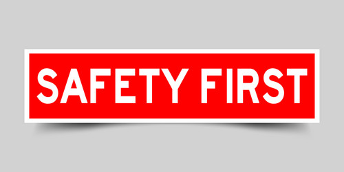 Gold color safety first word round sticker Vector Image