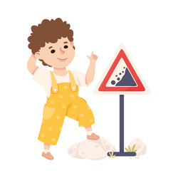 Cute boy showing stop gesture while standing next Vector Image