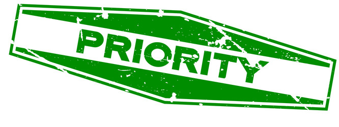 Grunge red first priority word square rubber seal Vector Image