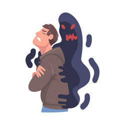 Young man feeling anger and malice grasped by dark