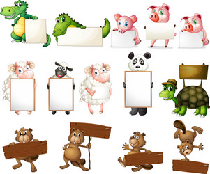 Wild animals cartoon holding blank sign Royalty Free Vector
