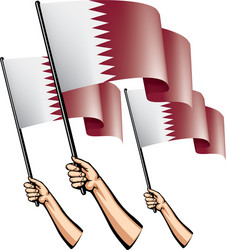 Qatar flag and hand on white background Royalty Free Vector