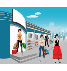 Visitors walking modern shopping mall with clothes